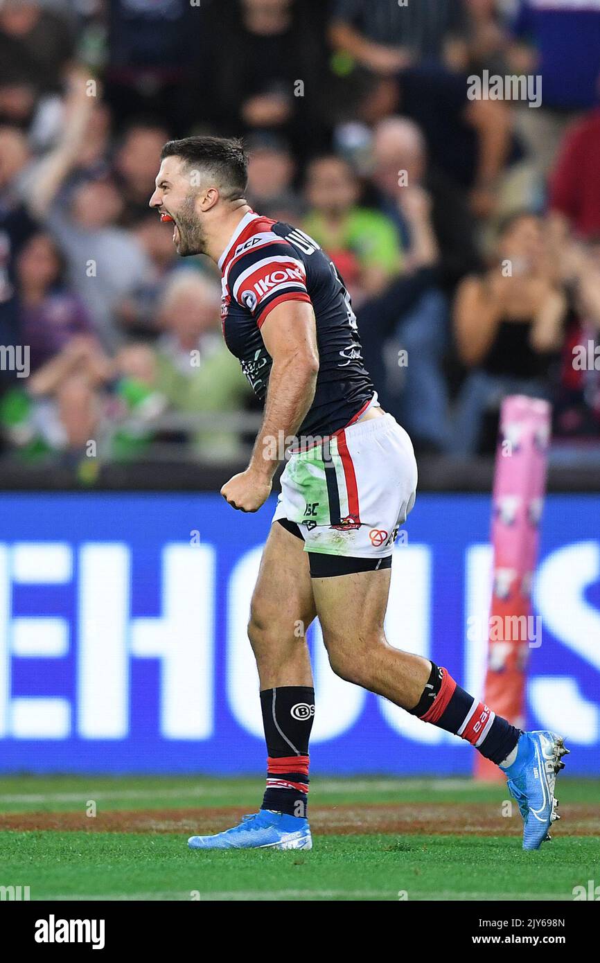 James Tedesco of the Roosters celebrates after scoring a try during the ...