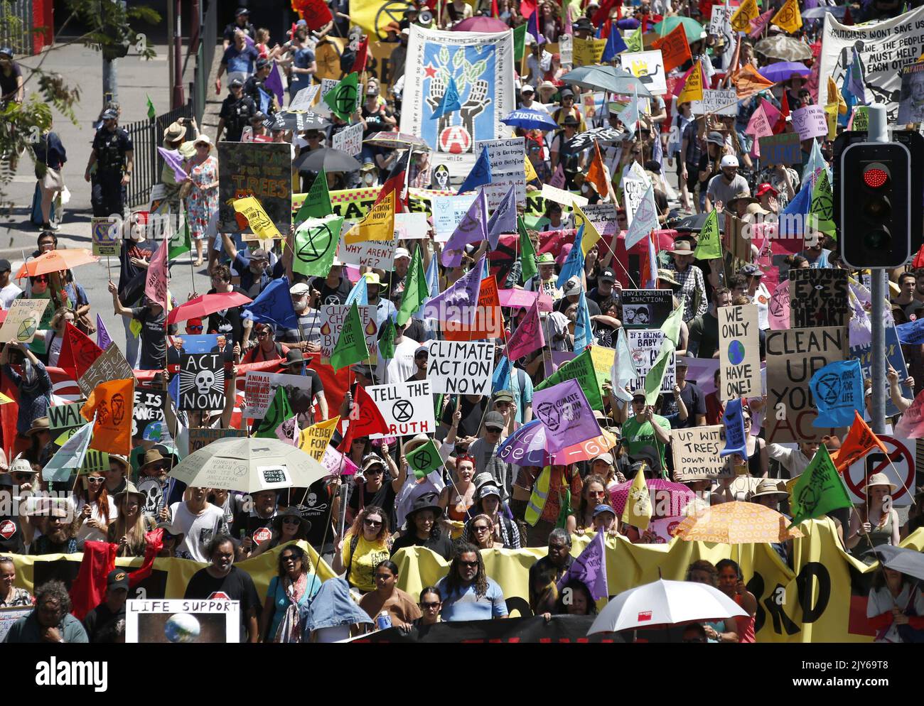 Extinction Rebellion activists march during Brisbane Rebellion Week ...