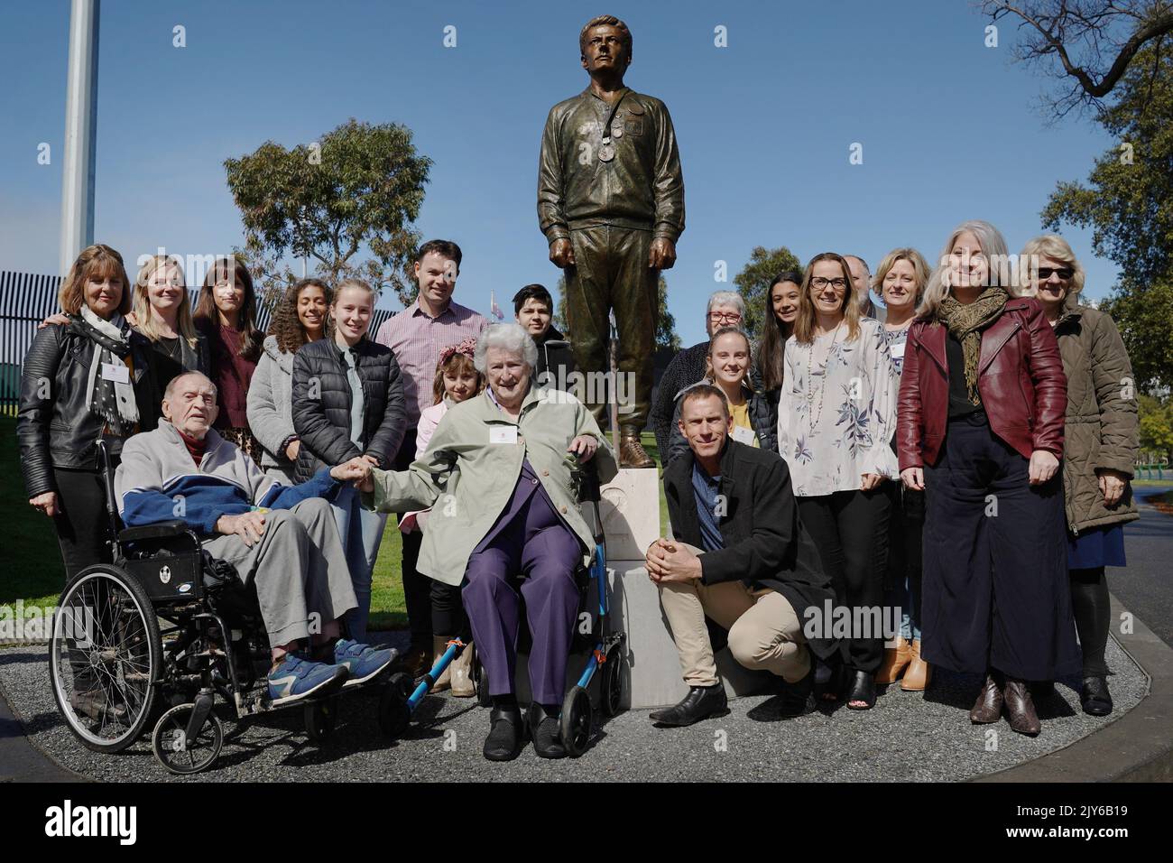 The Norman family pose after the unveiling of a statue to honour 1968 ...