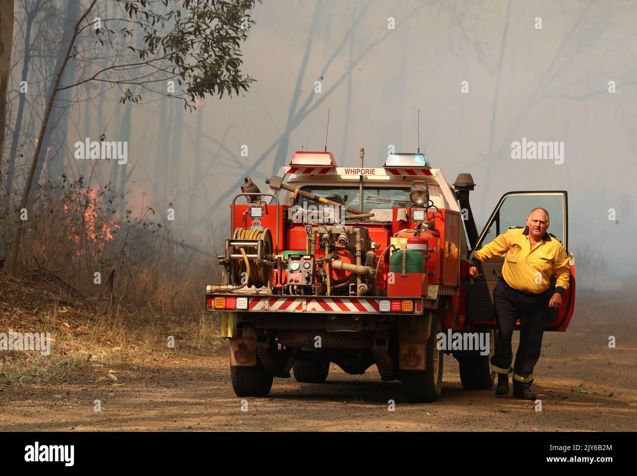 Firefighters battle bushfires in Busbys Flat, northern NSW, Wednesday ...