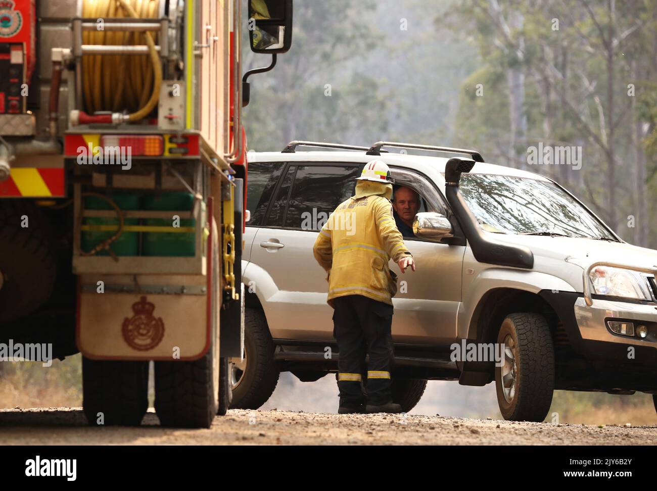 Firefighters battle bushfires in Busbys Flat, northern NSW, Wednesday ...