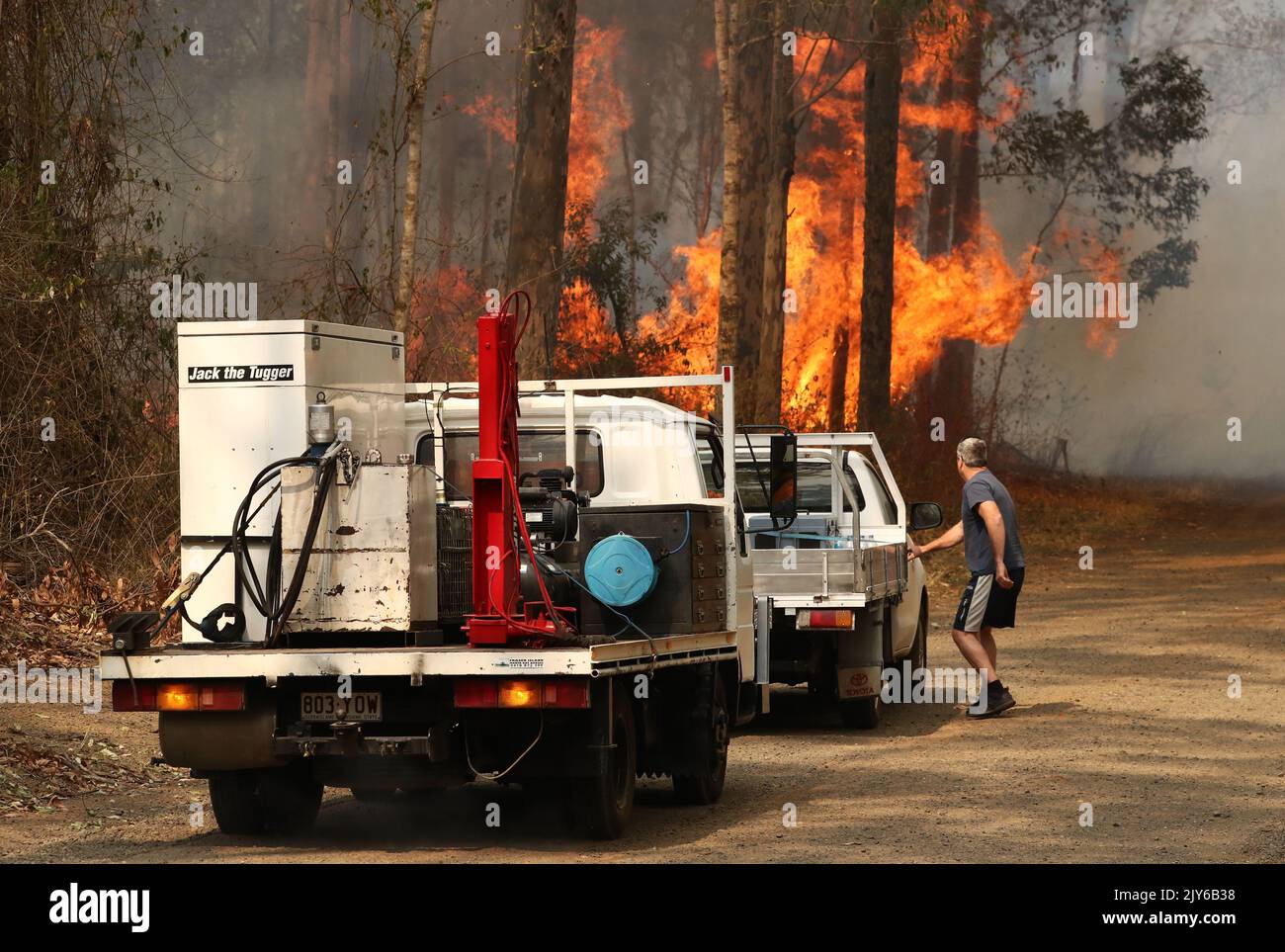 Firefighters battle bushfires in Busbys Flat, northern NSW, Wednesday ...