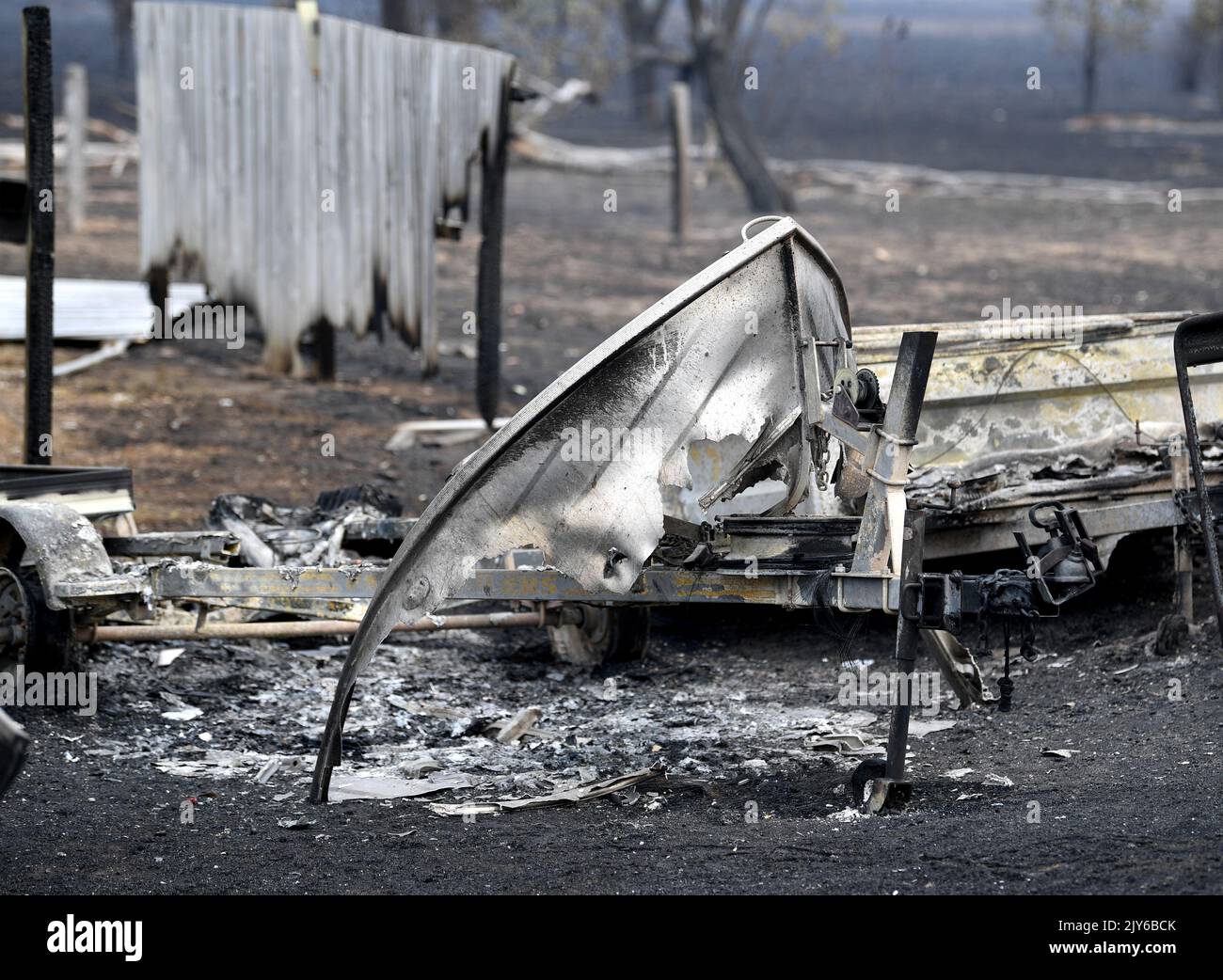 The burnt remains of a boat is seen in Laidley, southeast Queensland ...