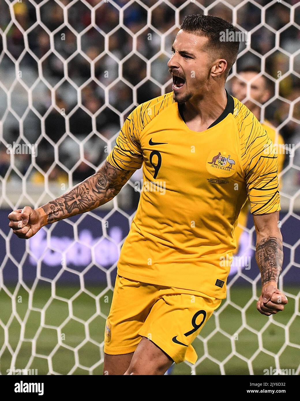 Jamie Maclaren of Australia celebrates after scoring his third goal ...