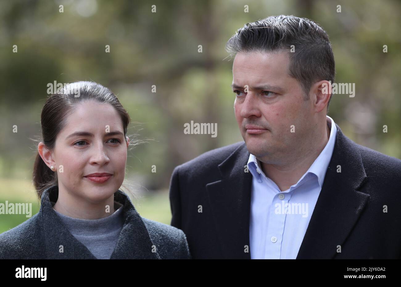 Victorian MP Will Fowles, with his wife Jessica, speaks to the media ...