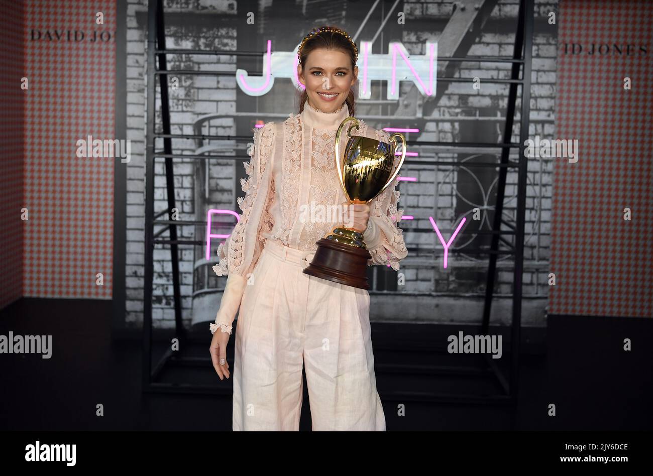 Model Victoria Lee poses with the Caulfield Cup during the Caulfield ...