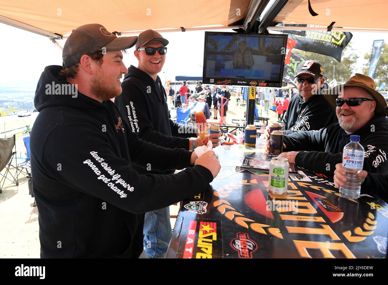 Spectators watch on from a makeshift bar during practice ahead of the ...
