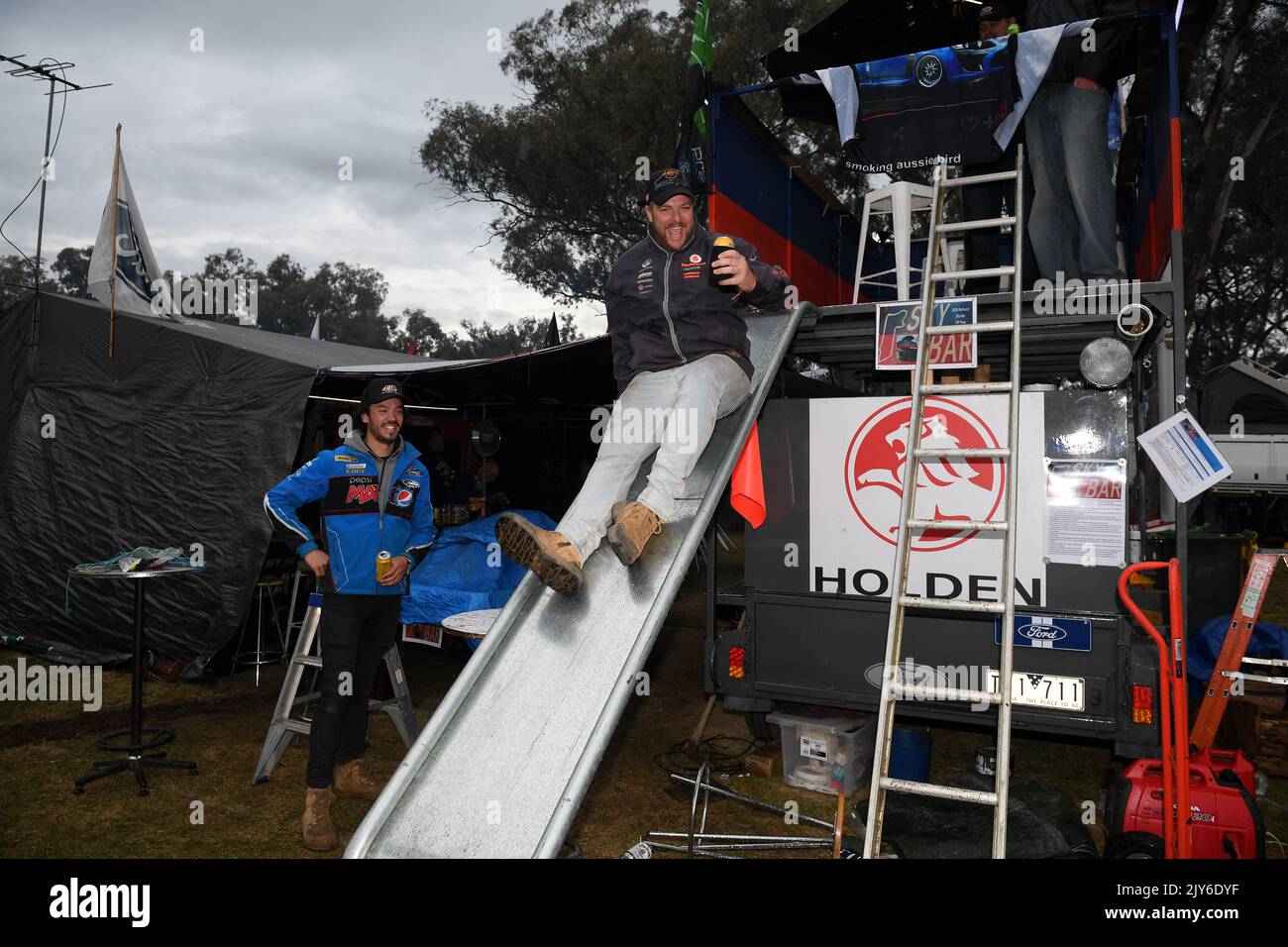 James Gillespie (right) is seen at his campsite during the 2019 ...