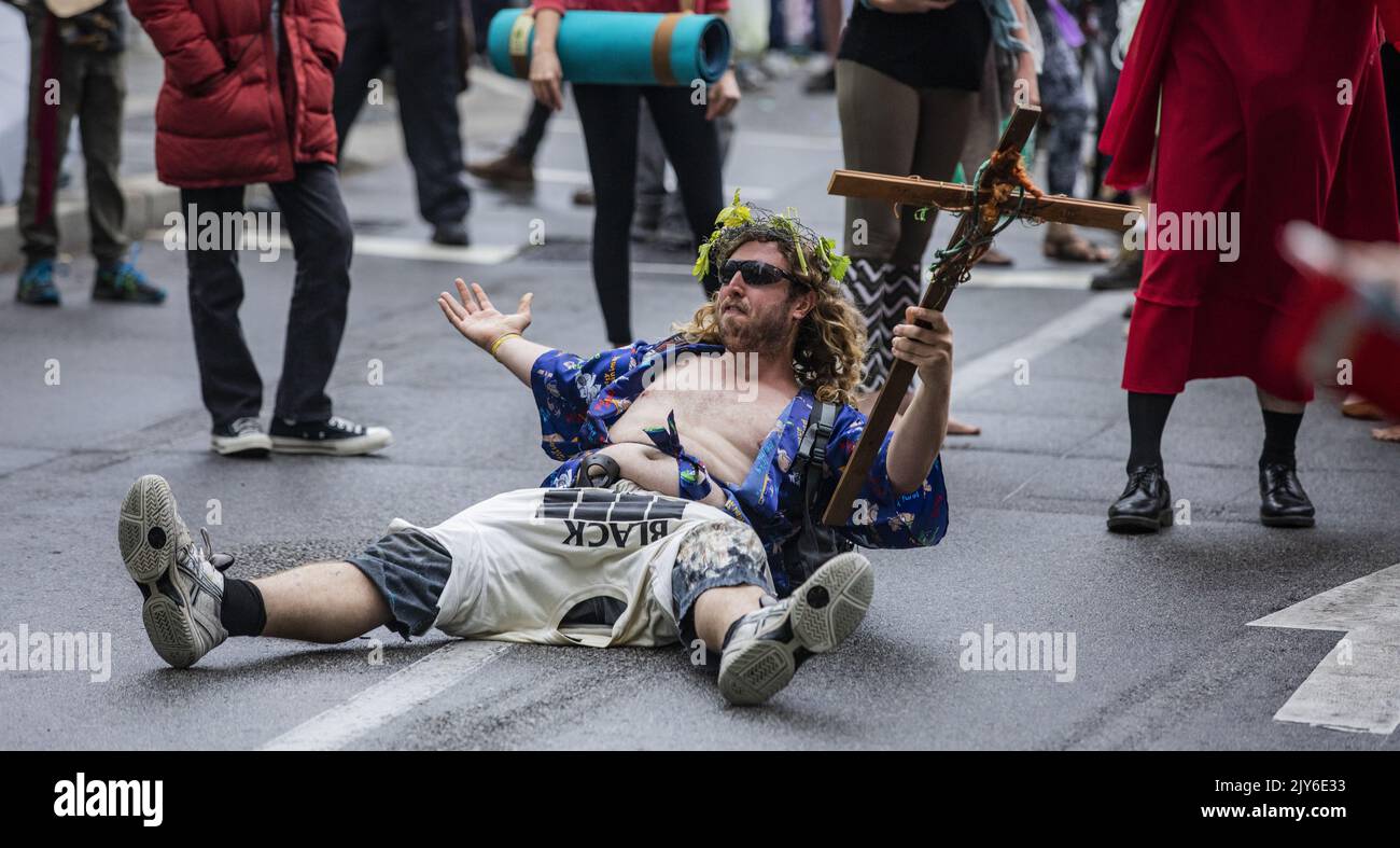 Activists from Extinction Rebellion participate in a protest in Perth ...