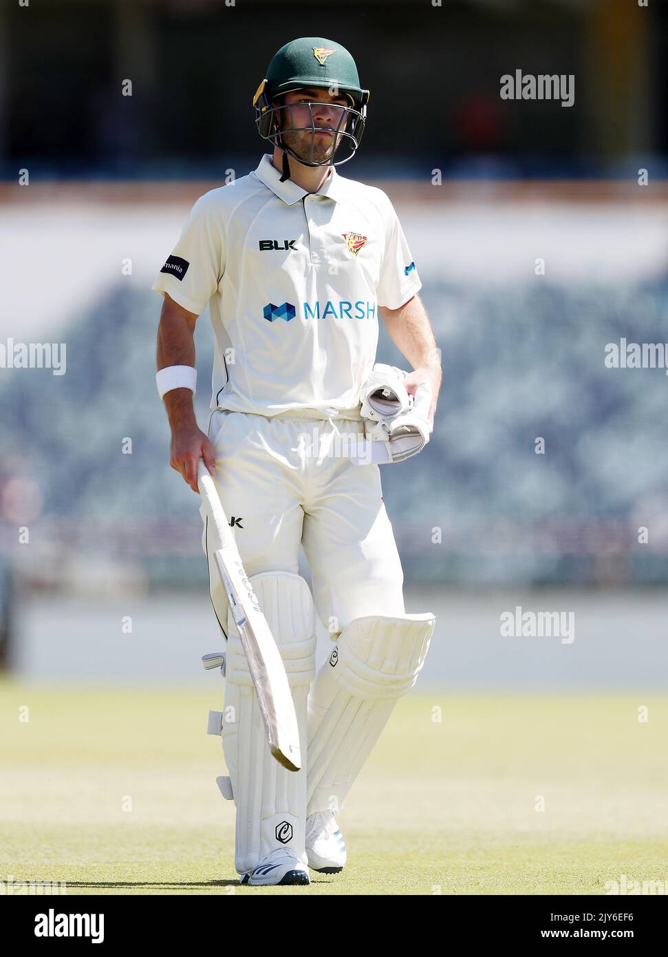 Caleb Jewell of Tasmania looks dejected as he walks off the field ...