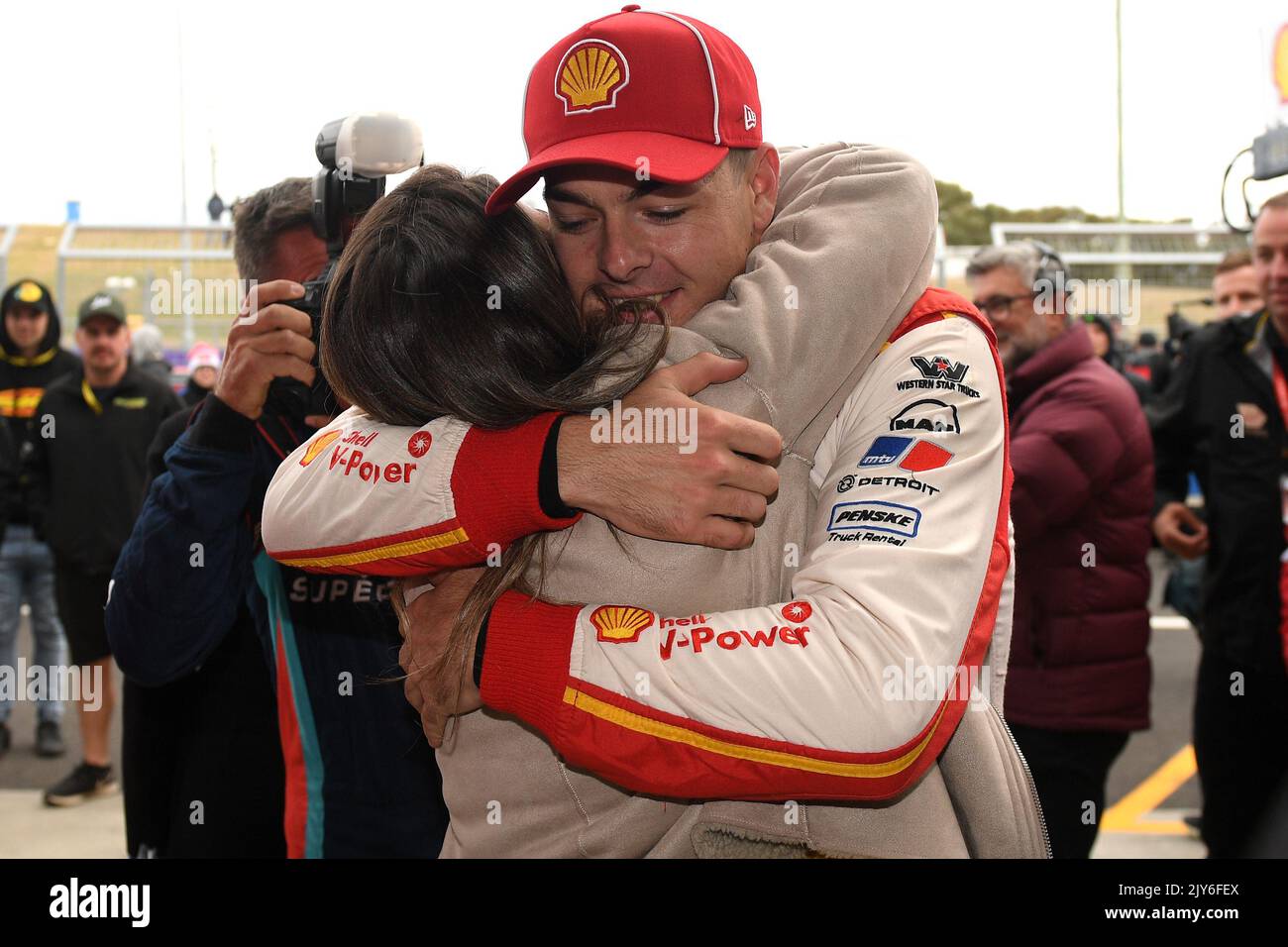 Scott McLaughlin embraces his partner Karly Paone after winning the Top ...