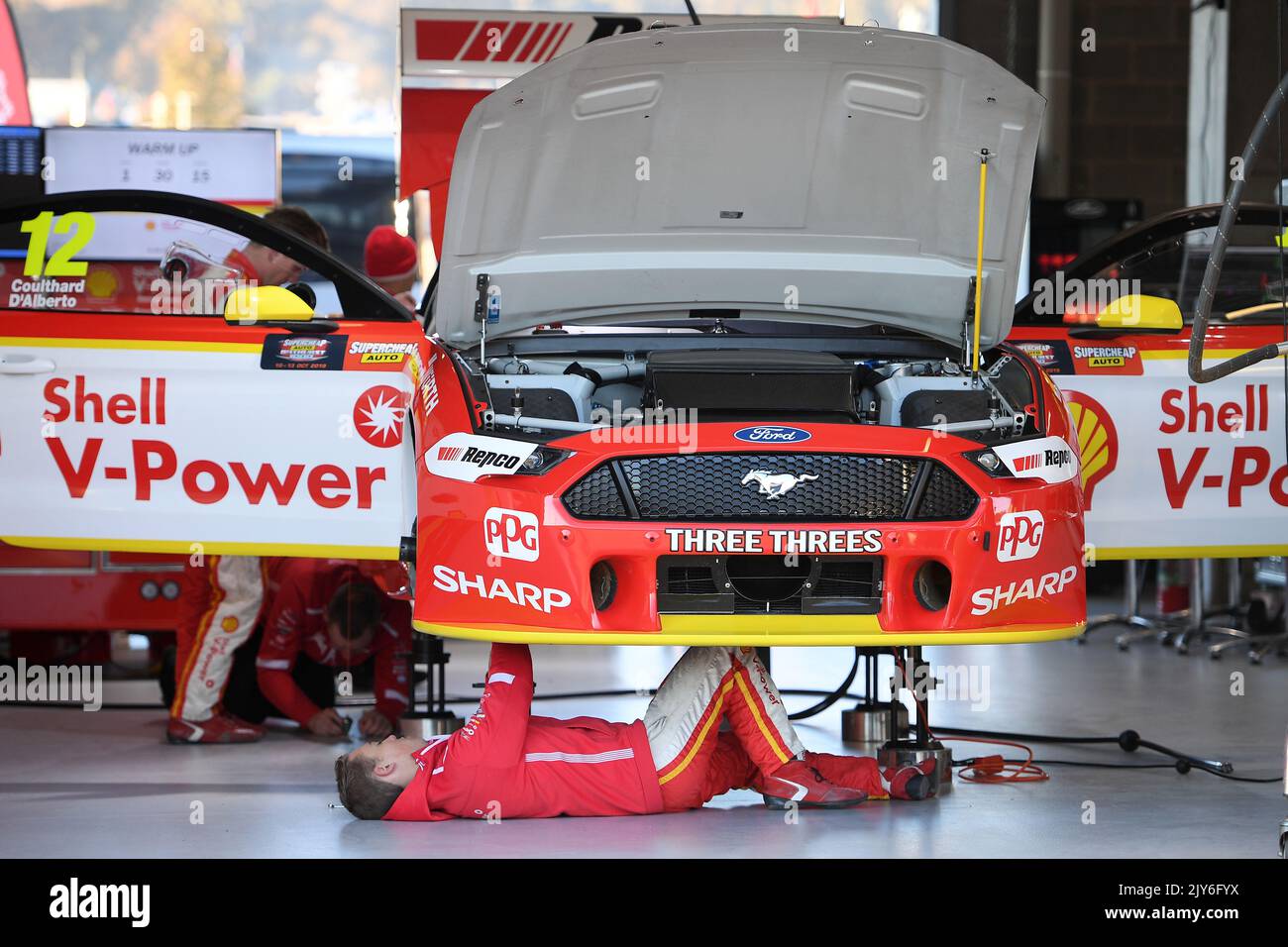 Crew work on Fabian Coulthard's Shell V-Power Racing Team Ford ahead of ...