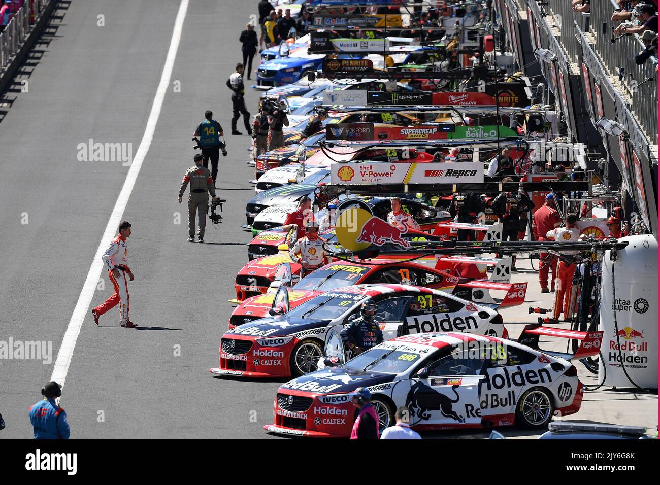 Cars are seen being prepared in pit lane ahead of the start of the 2019 ...