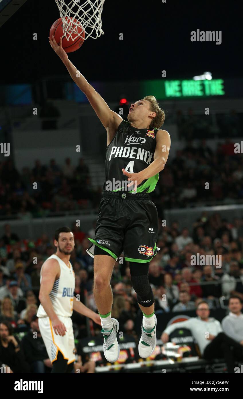 Kyle Adnam of the Phoenix lays up during the NBL round two match ...