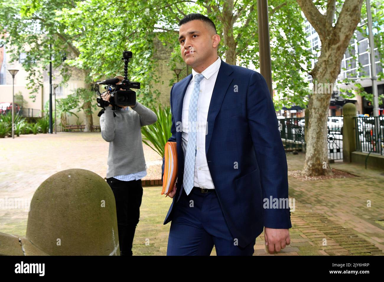 Zemarai Khatiz, lawyer for Mert Ney, arrives at Central Local Court in ...