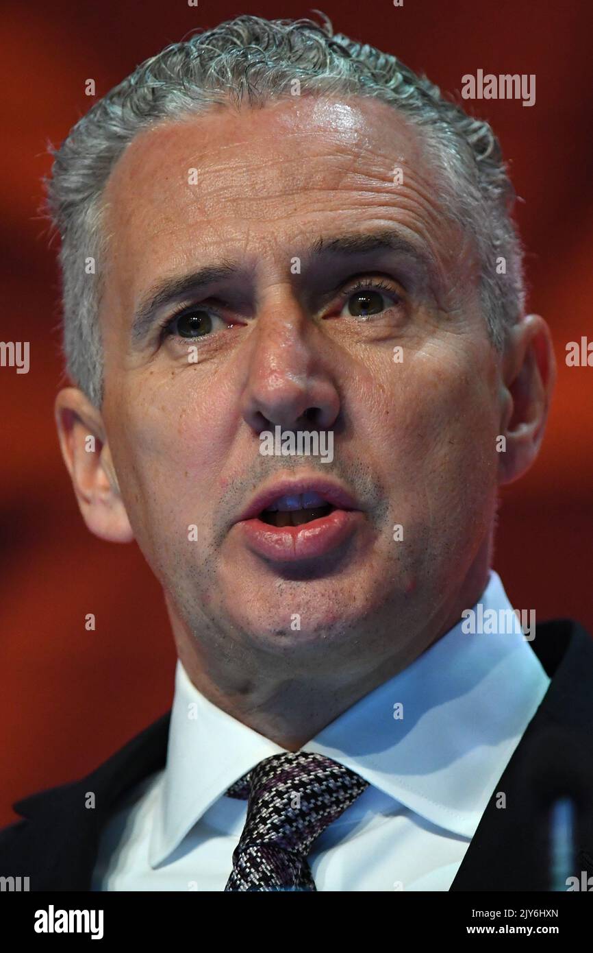 Telstra Chief Executive Officer Andy Penn addresses the floor during ...
