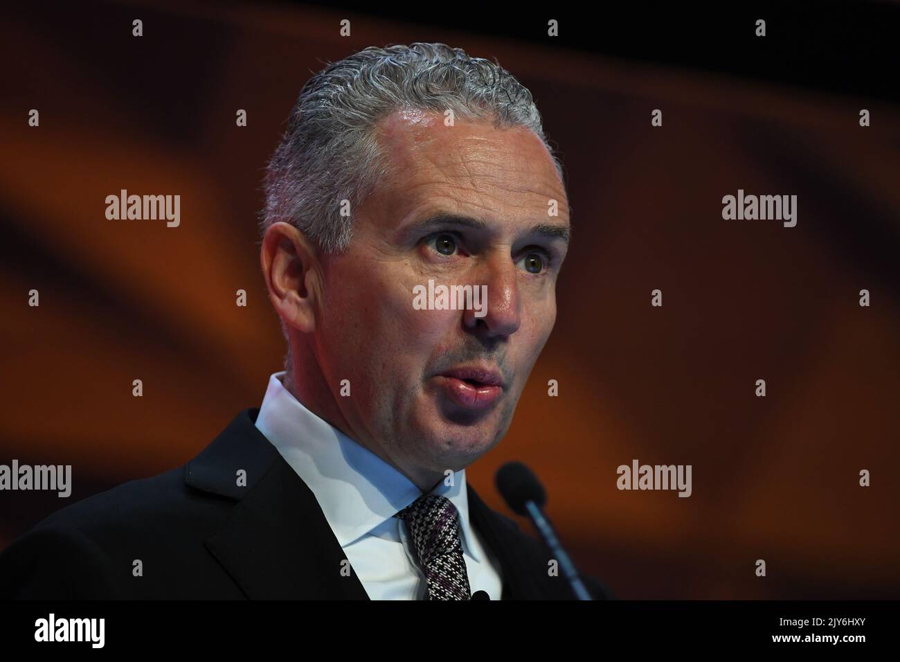 Telstra Chief Executive Officer Andy Penn addresses the floor during ...