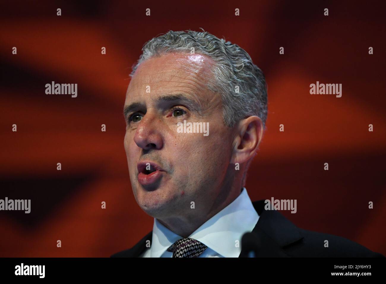 Telstra Chief Executive Officer Andy Penn addresses the floor during ...