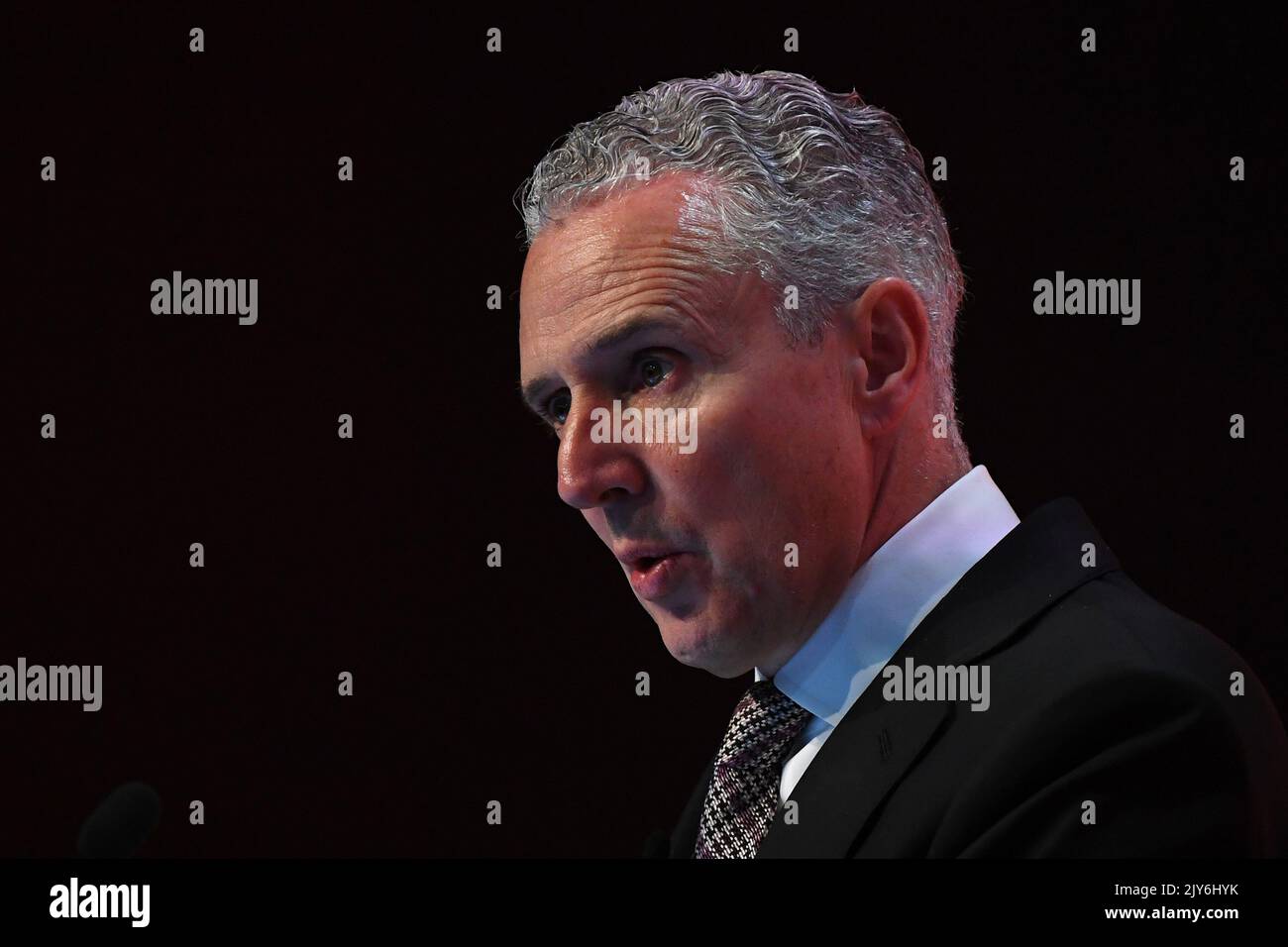 Telstra Chief Executive Officer Andy Penn addresses the floor during ...
