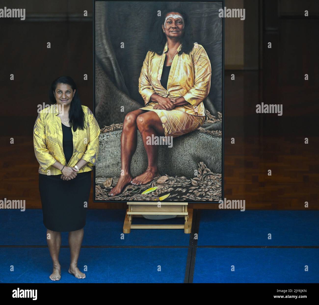 Former Labor senator Nova Peris poses for a photograph next to her ...
