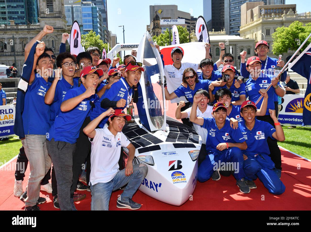 Japanese solar car Tokai University team members are seen at the finish ...