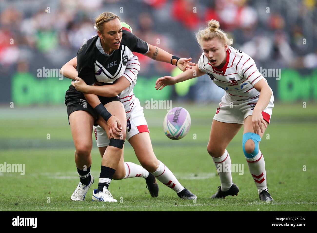 Krystal Rota of New Zealand is tackled by the England defence in the ...