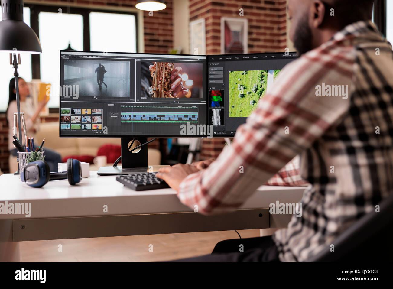Content creator editing video montage on film production software ...