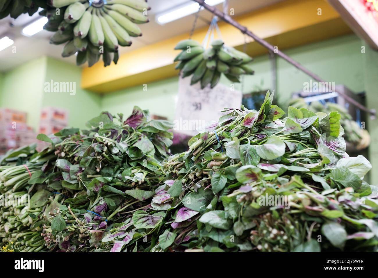 Green Chinese vegetables and bananas for sale at a Vietnamese grocer in ...