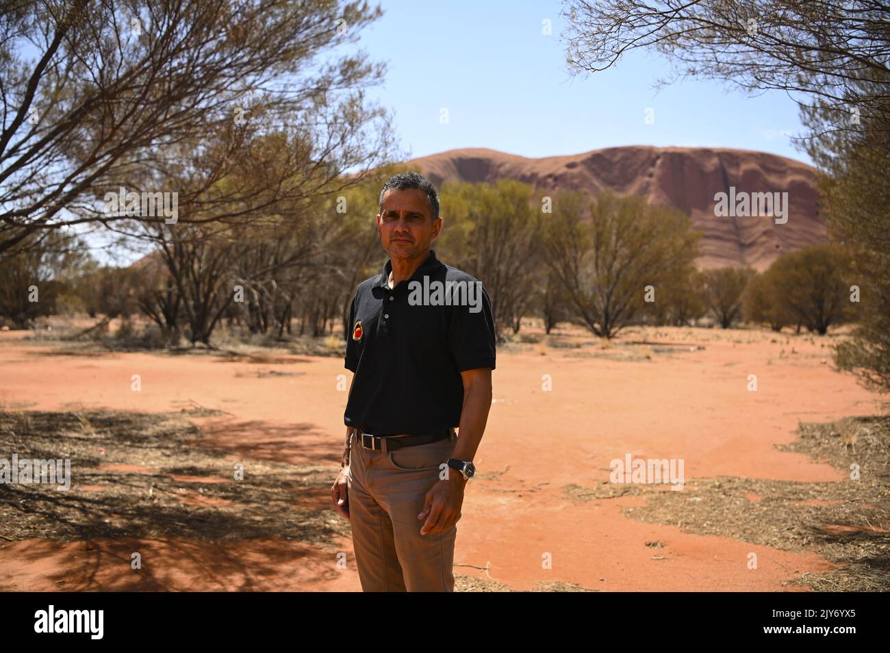 Manager of Uluru Kata-Tjuta Park Mike Misso poses for photographs near ...