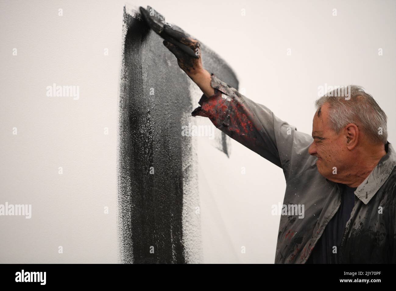 Australian artist Mike Parr performs Towards an Amazonian Black Square ...