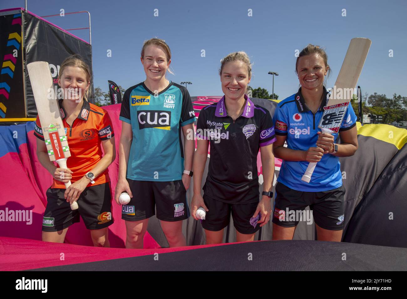L-R, Jemma Barsby of the Perth Scorchers, Maddy Green of the Brisbane ...