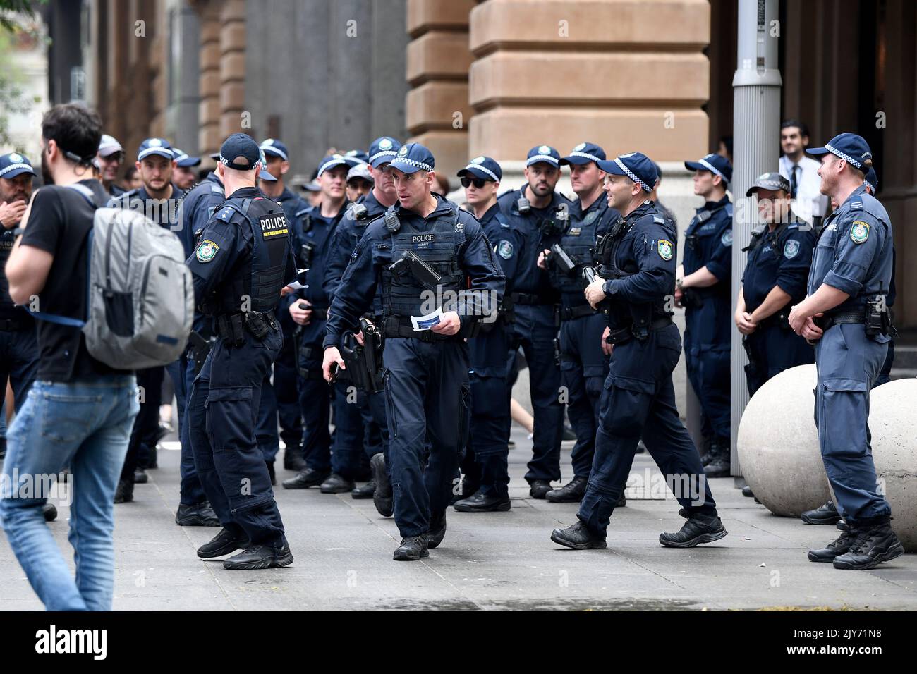 NSW Riot Police officers are seen at an Extinction Rebellion rally in ...