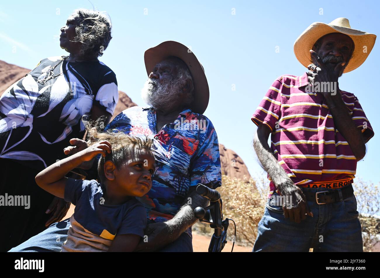 Traditional owners Reggie Uluru and Cassidy Uluru (right) pose for ...