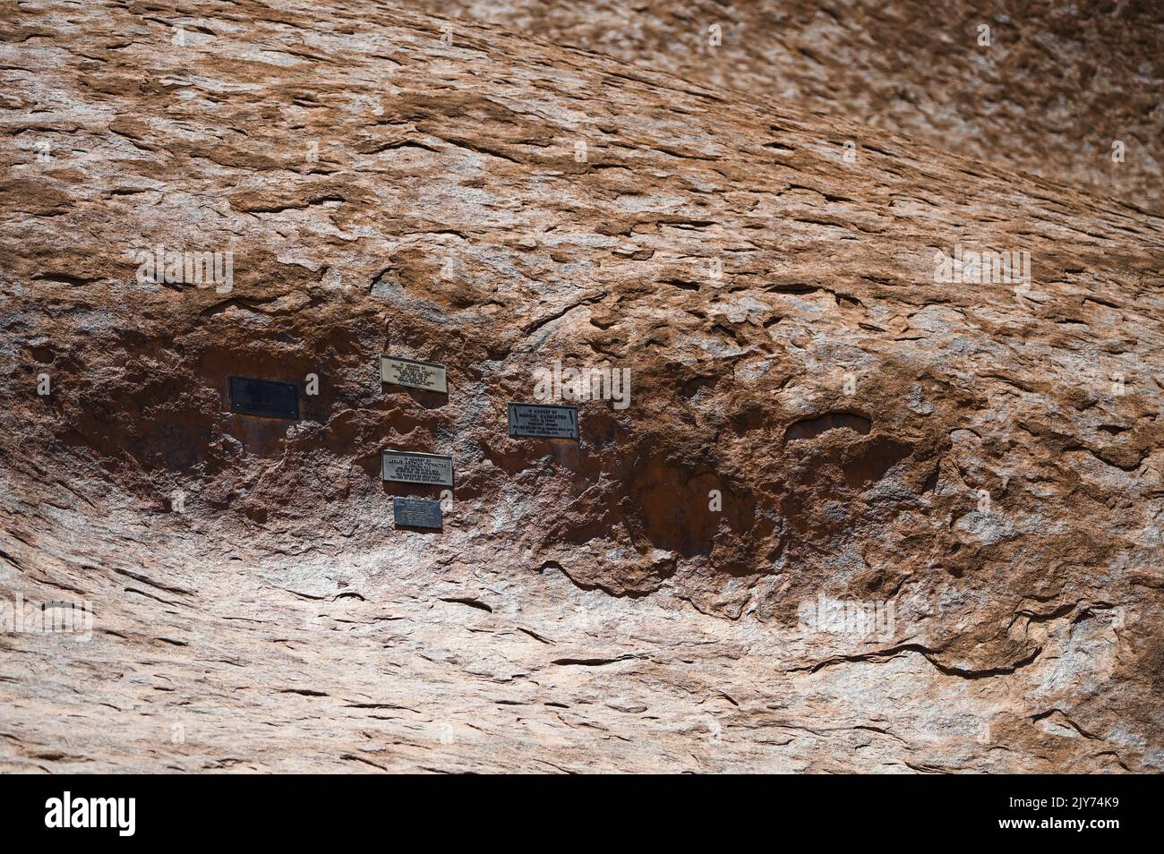Memorial plaques for people who died while climbing Uluru are seen at ...