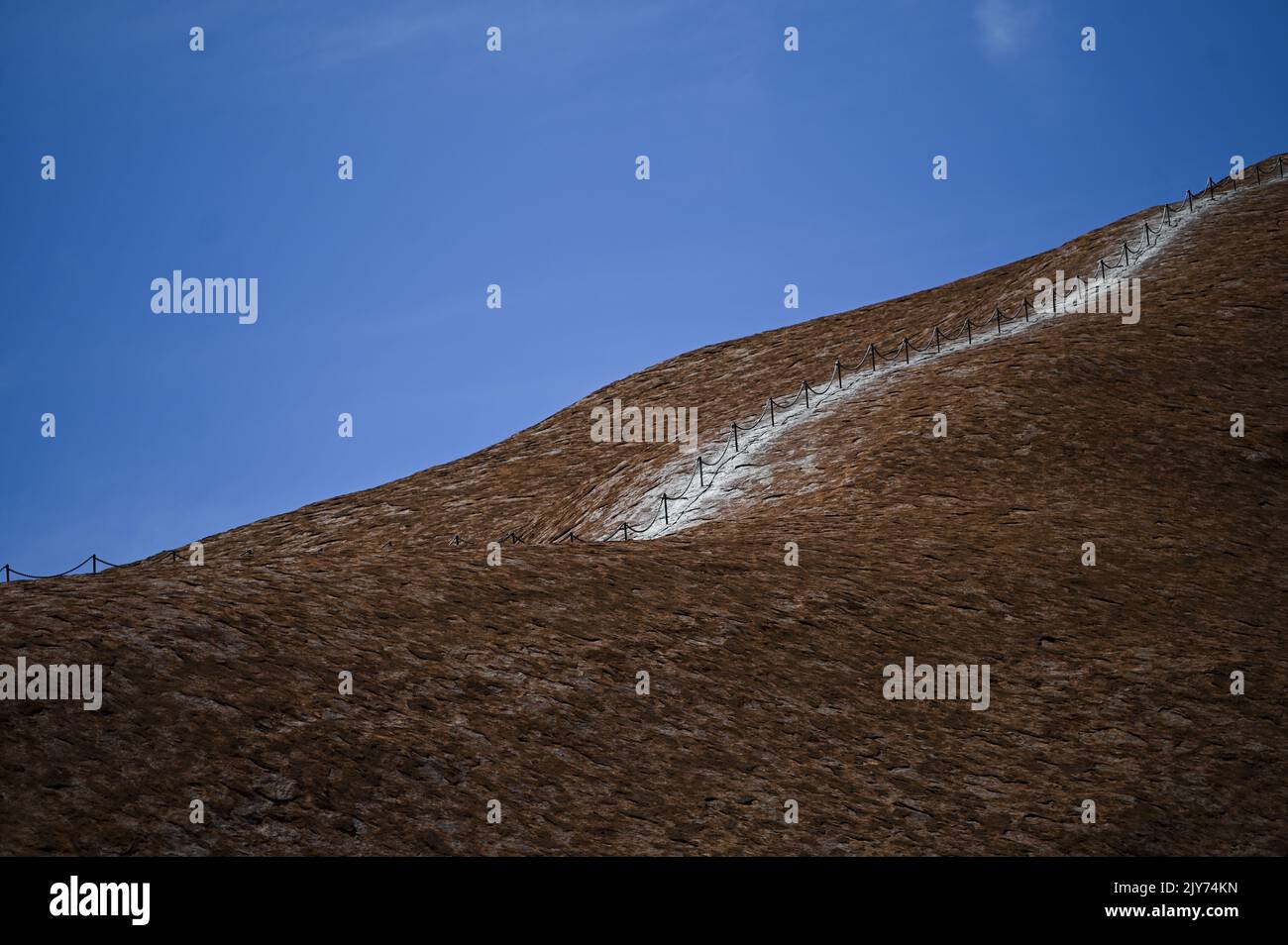 The climbing chain is seen at Uluru, also known as Ayers Rock at Uluru ...