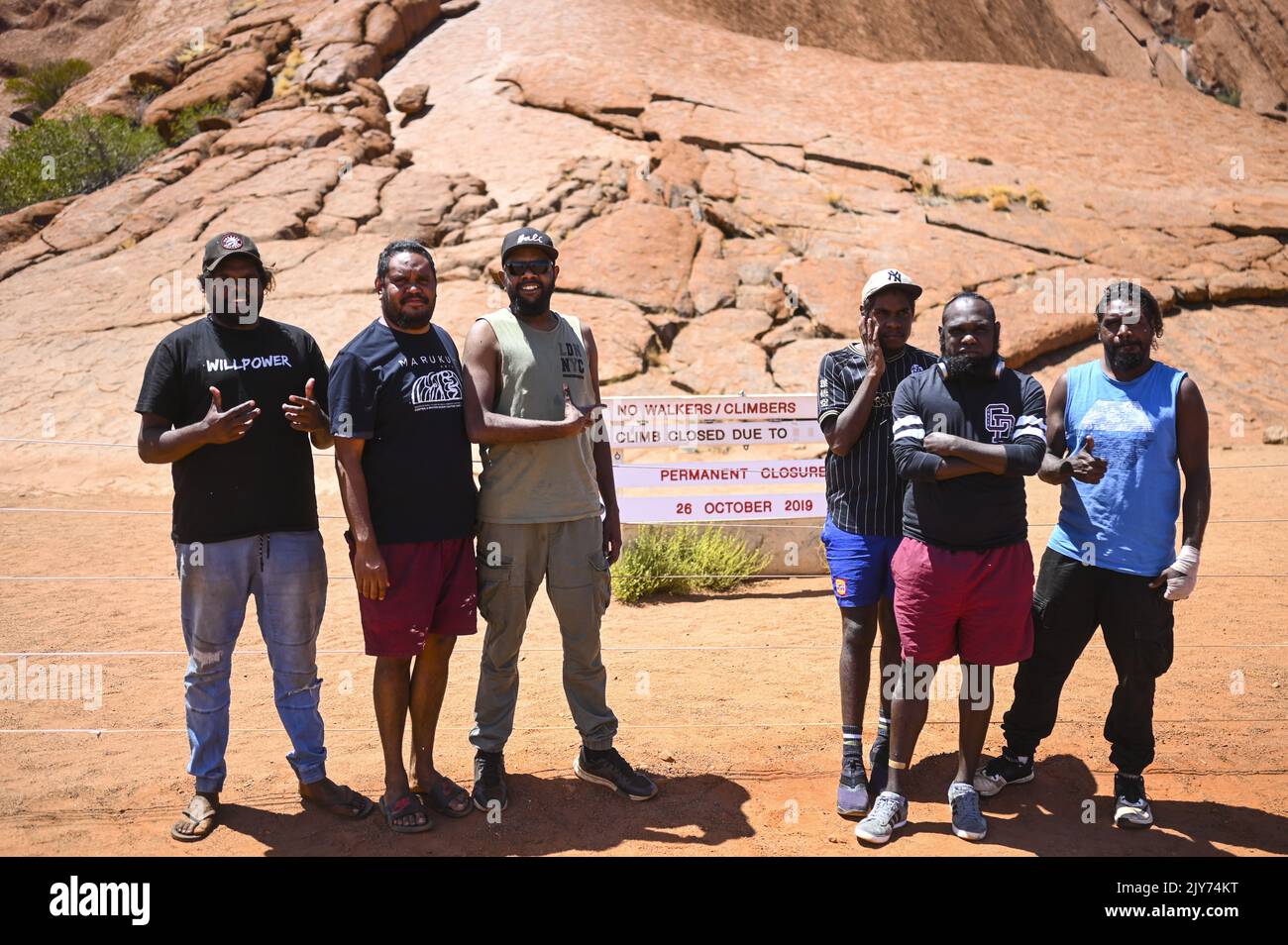 Members of the Mala Band pose for photographs near the newly installed ...
