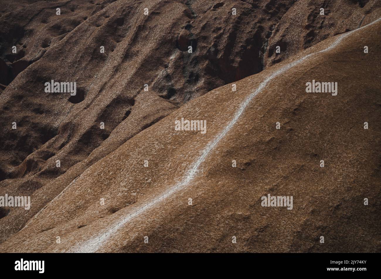 The climbing chain is seen at Uluru, also known as Ayers Rock at Uluru ...