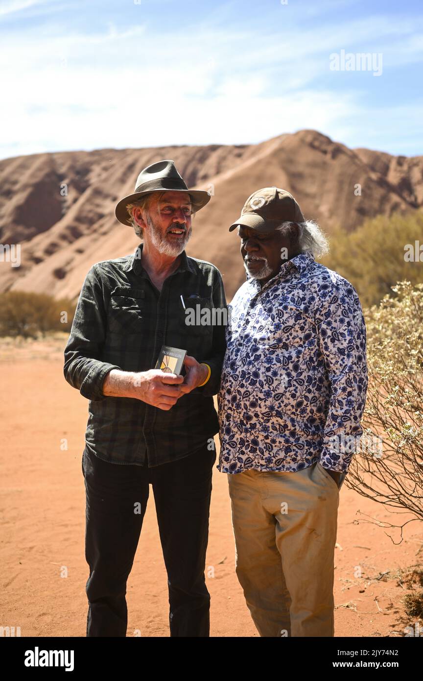 Musicians Trevor Adamson (right) and Shane Howard pose for photographs ...
