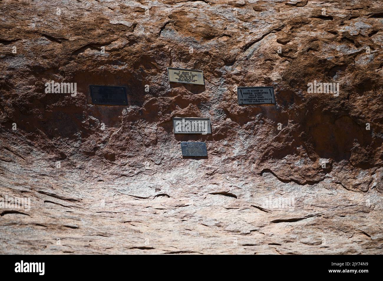 Memorial plaques for people who died while climbing Uluru are seen at ...