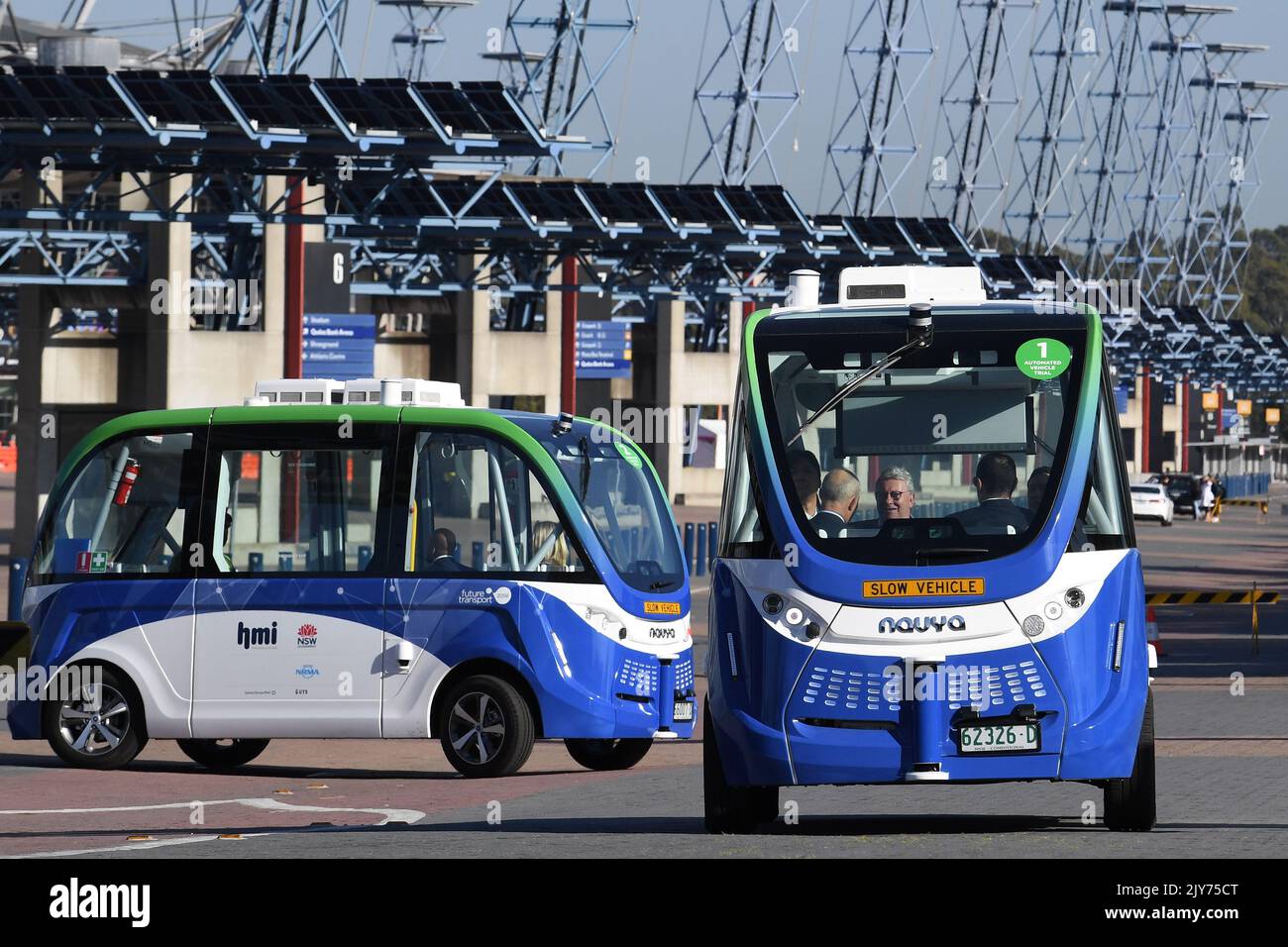 Two of the the new driverless buses being trialled at Sydney Olympic ...