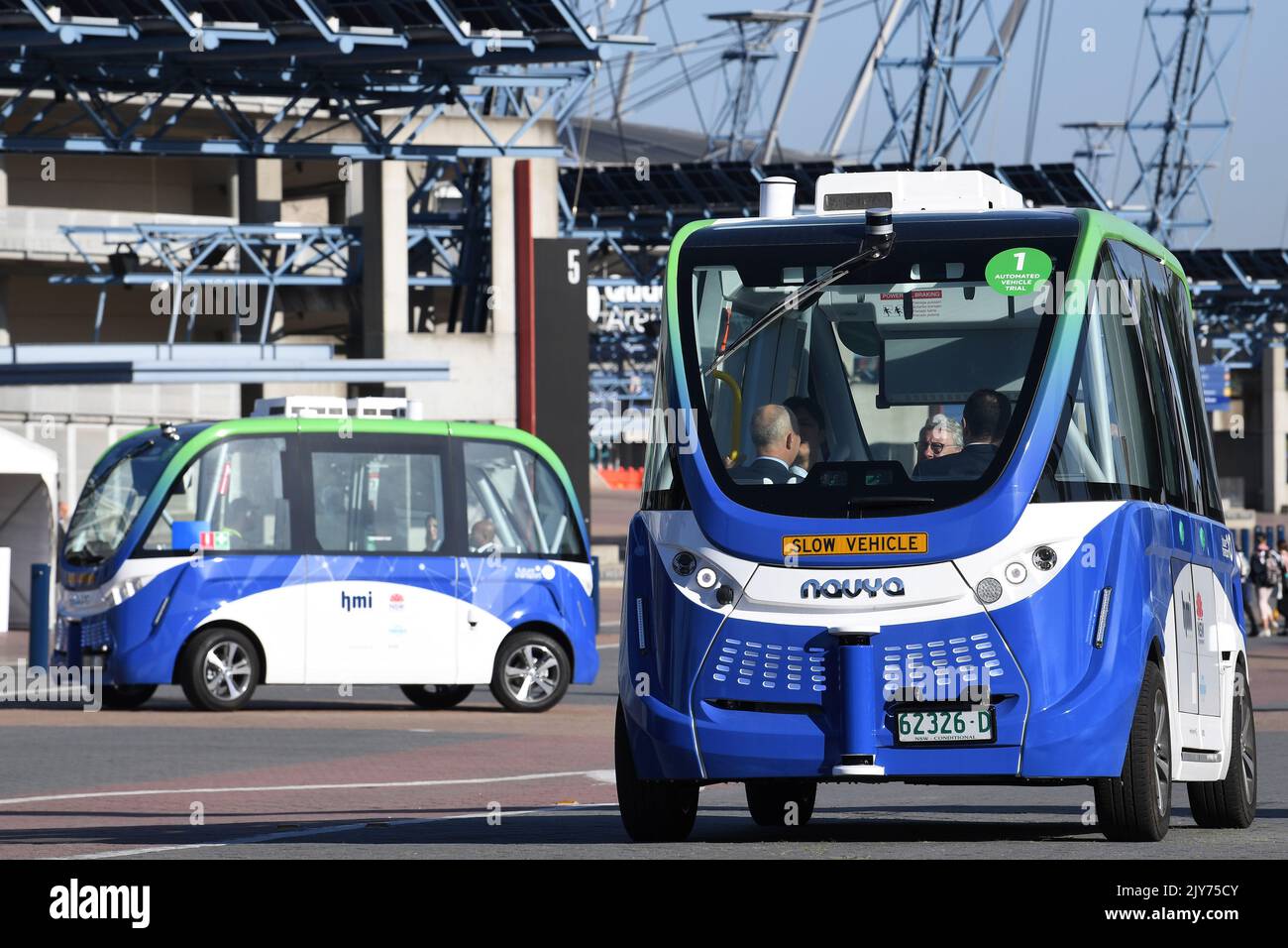 Two of the the new driverless buses being trialled at Sydney Olympic ...