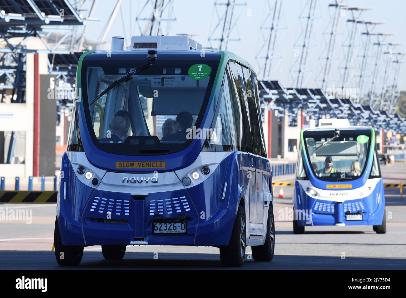 Two of the the new driverless buses being trialled at Sydney Olympic ...