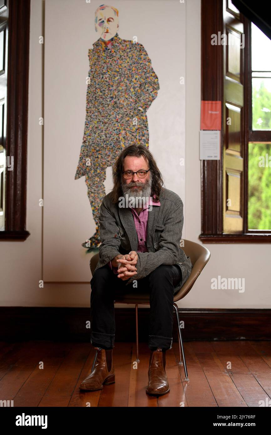 Australian artist What poses for a photograph with his work Robert ...