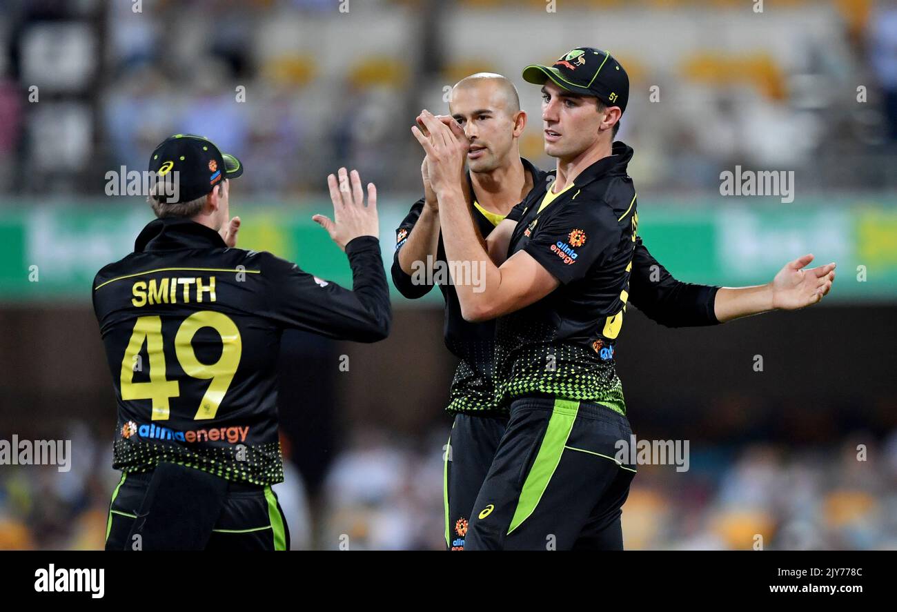 Steve Smith (left), Ashton Agar (centre) and Pat Cummins (right) of ...