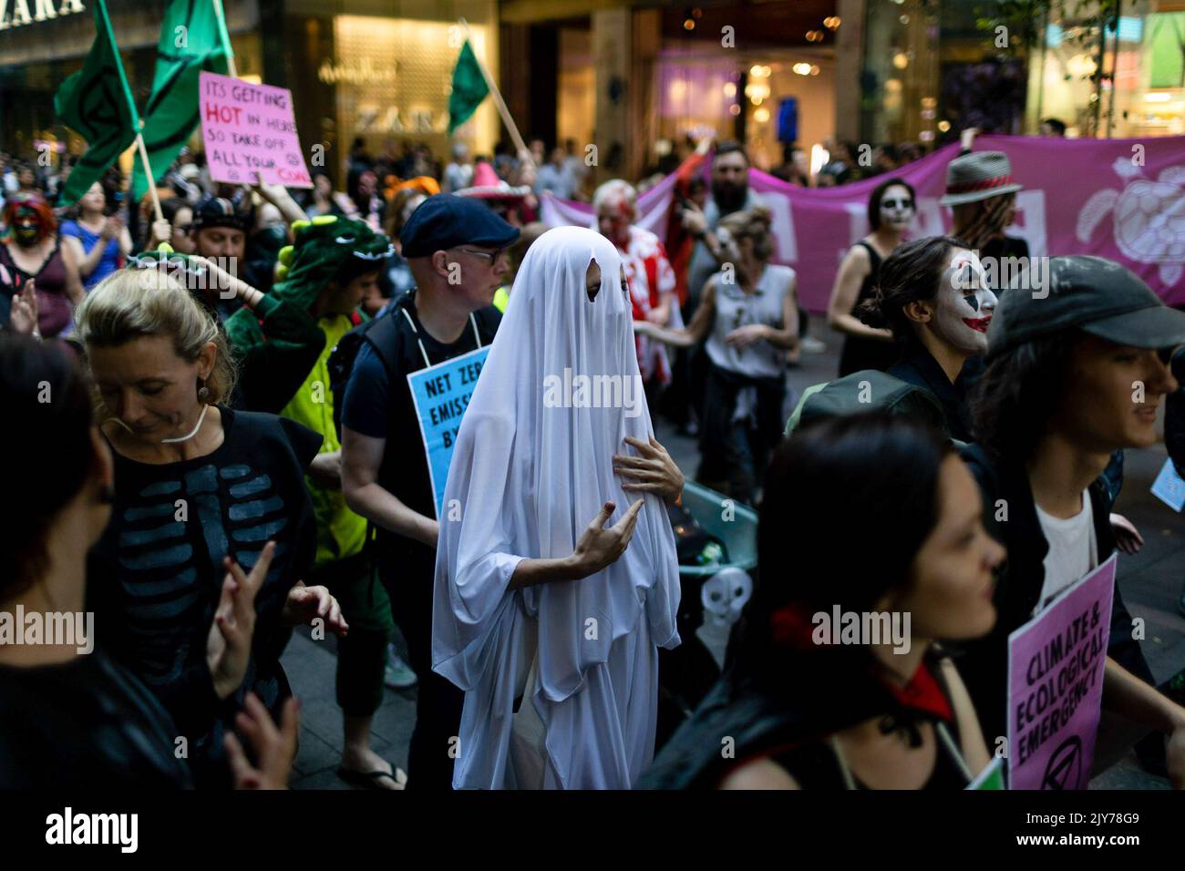 Protesters participate in a Halloween themed Extinction Rebellion rally ...