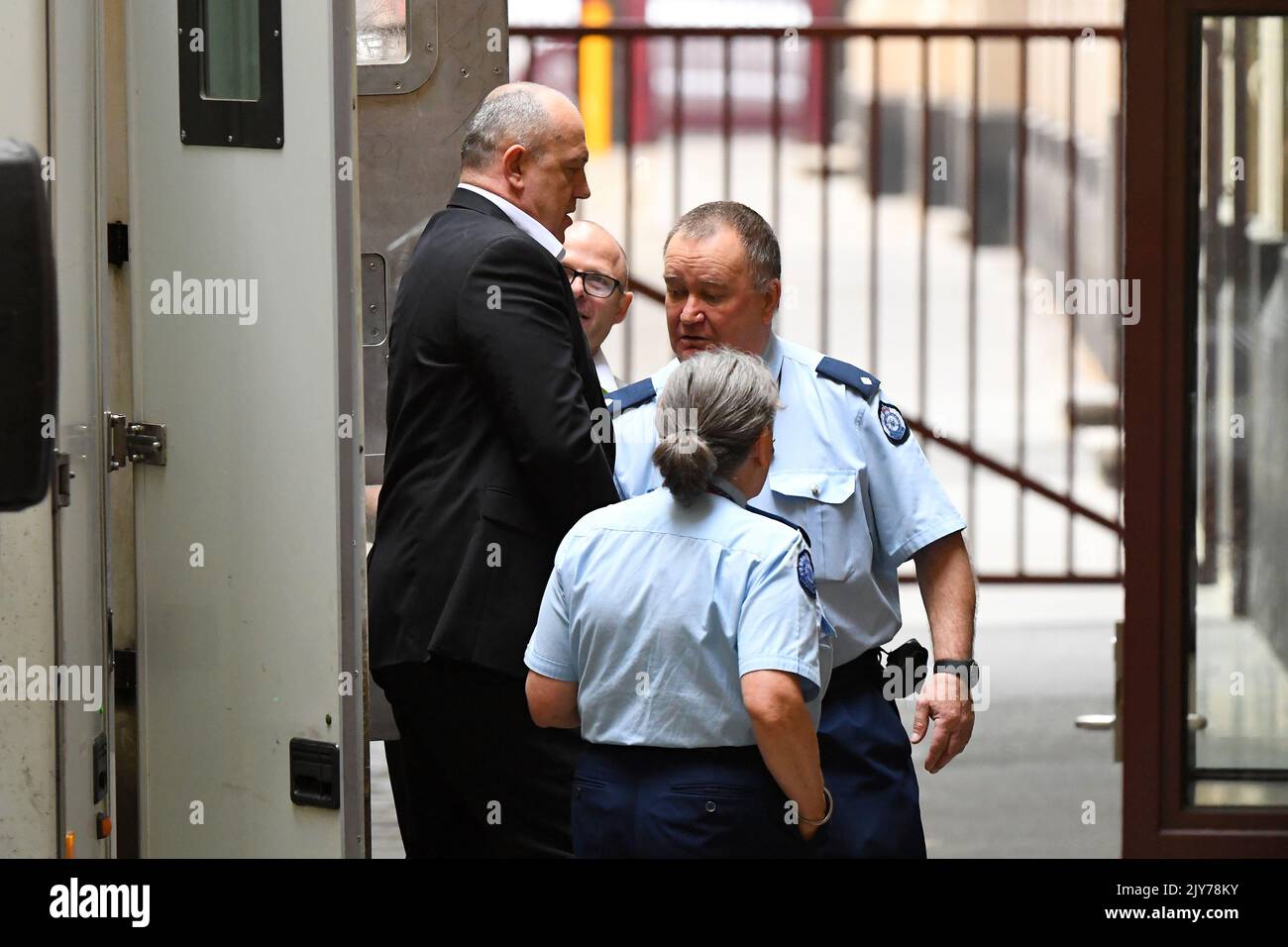 Robert Strucelj (left) arrives to the Supreme Court of Victoria in ...