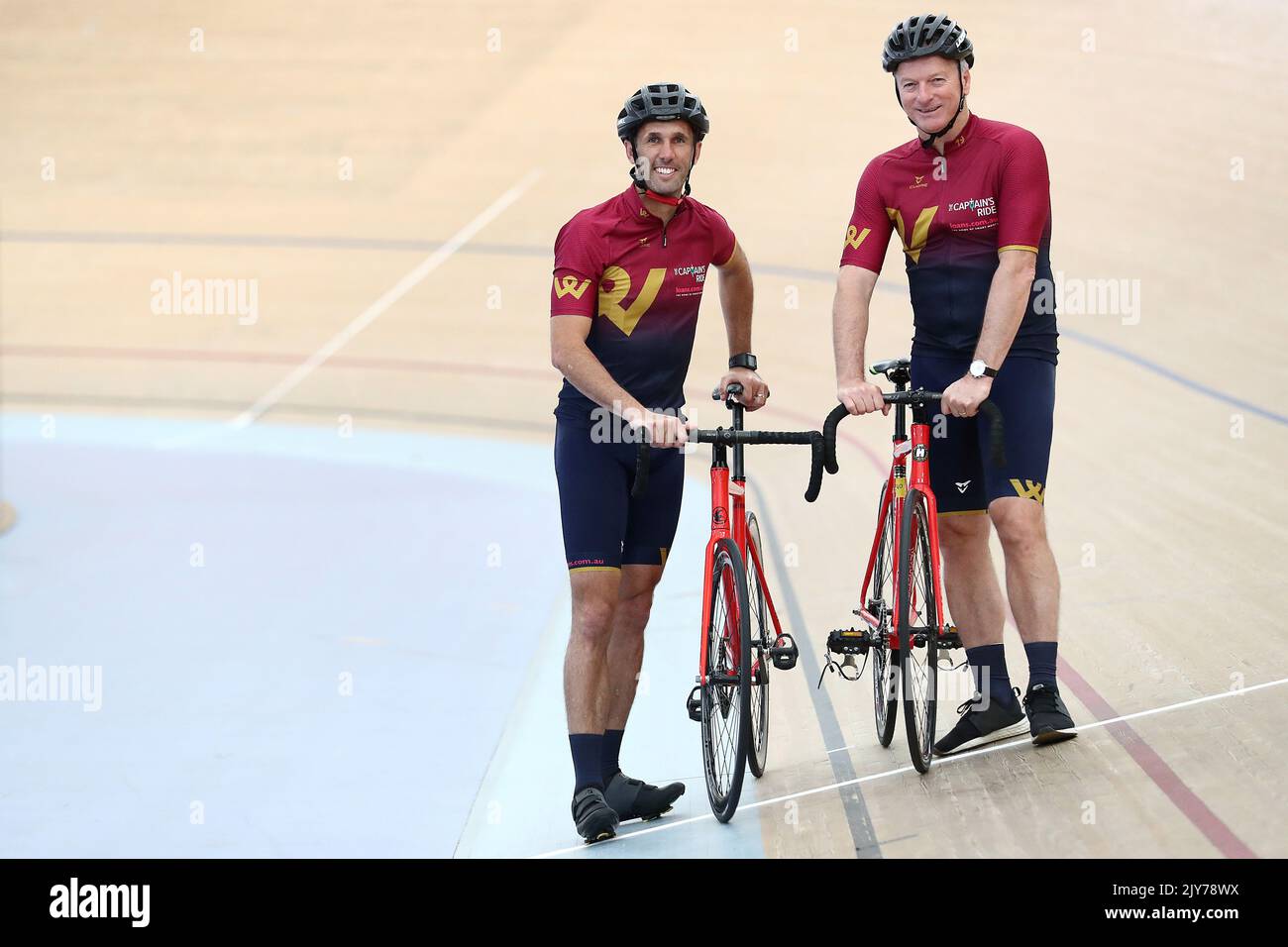Mark Knowles and Steve Waugh pose for a photo during the captains ride ...