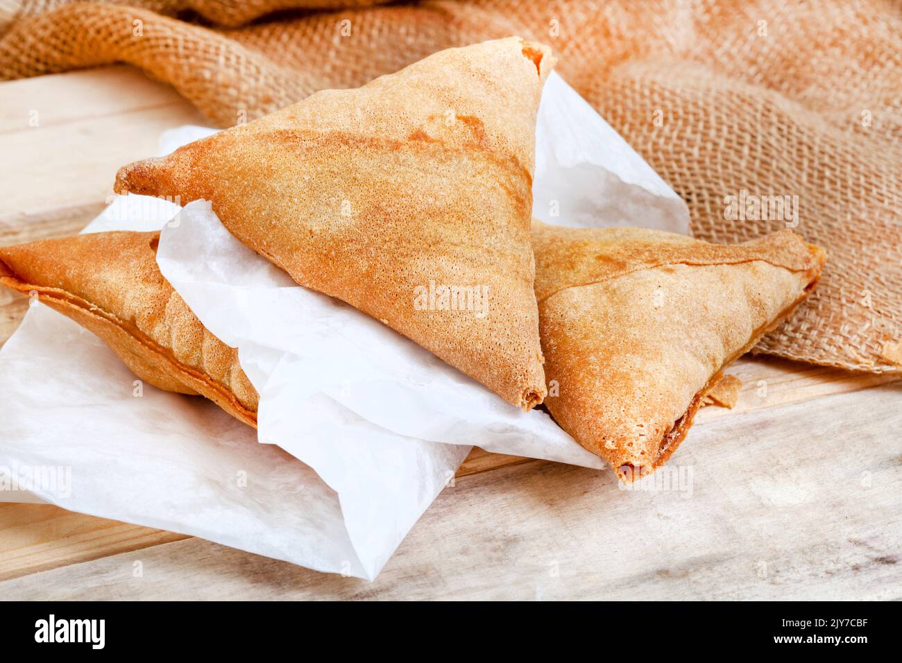 South African chicken Samosas on rustic table Stock Photo - Alamy