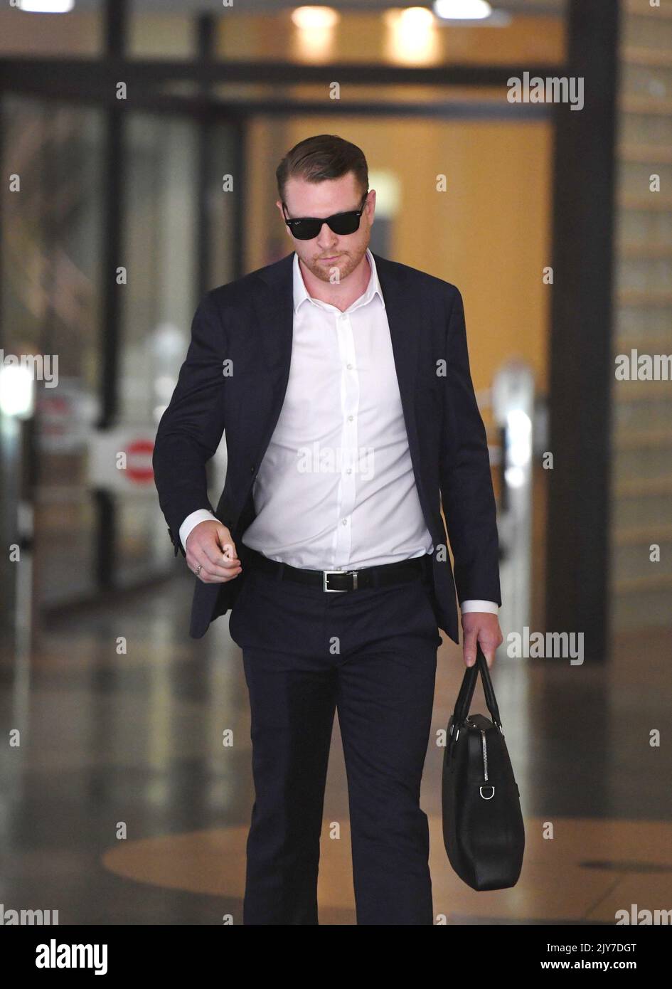 Two time Australian Olympian Joel Milburn leaves the Downing Centre ...