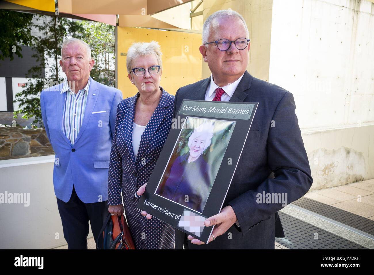 (L-R) Siblings Graham, Debra and Michael Barnes pose for a photograph ...